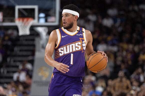 Suns Prepare for Heat Showdown Without Devin Booker - NewsBreak
