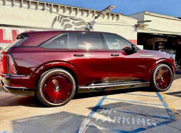 Cadillac Escalade IQ Turns Heads With Deep Burgundy Paint and Bold ...