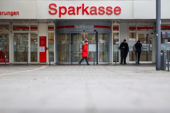 German bank re-opens after massive heist as customers seek answers ...