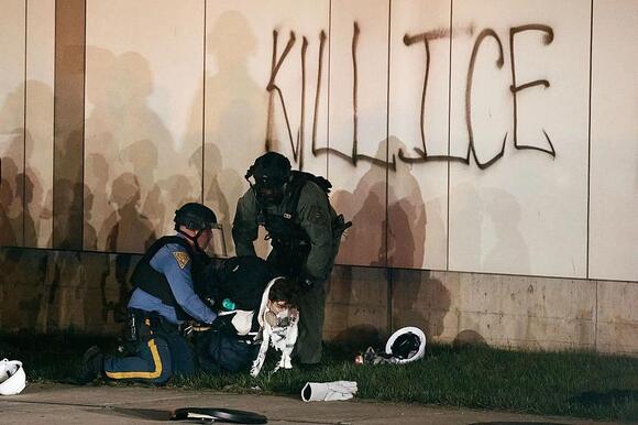 Riot police make multiple arrests as they clear protestors from Delaney ...