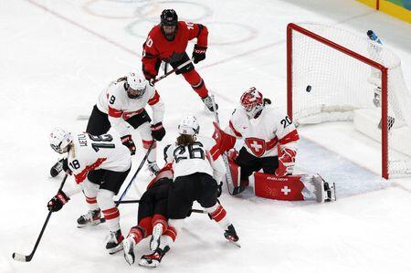 Olympics-Ice hockey-Canada look to captain Poulin in title defence ...