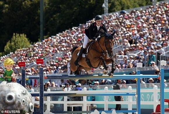 Eve Jobs' Olympic showjumper husband jumps off his horse for furious ...