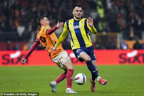 Istanbul derby is suspended after Fenerbahce fans 'threw FLARES towards ...
