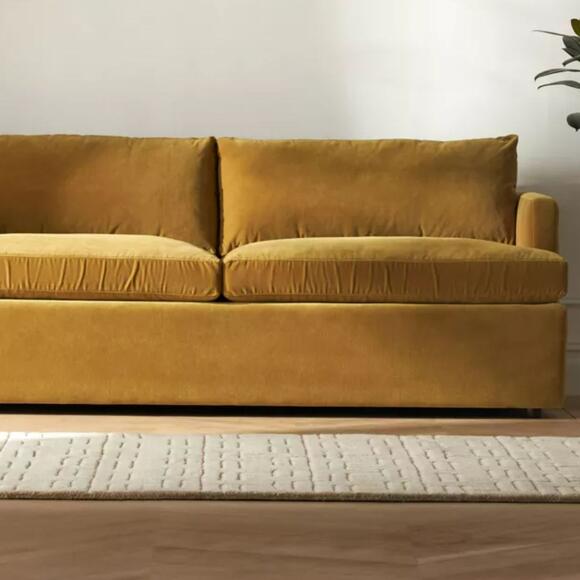 Hilary Duff's Mustard Sofa Pioneers An Unexpected 2026 Color Trend (And ...