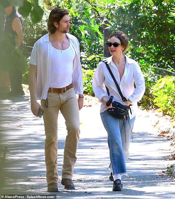 Lily James and her Swiped co-star Pierson Fode enjoy a playful stroll ...