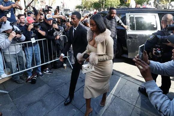 King Combs' girlfriend arrives at courthouse in busty dress with $30k ...