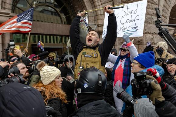 Far-Right Activist Jake Lang Chased Away by Counterdemonstrators During ...