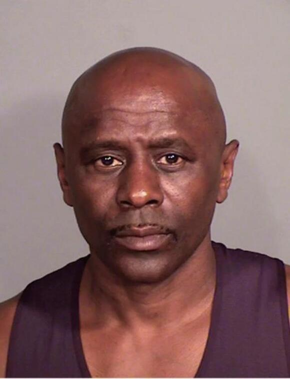 Man accused of hiding four corpses in Dunn Co. shooting fires attorney