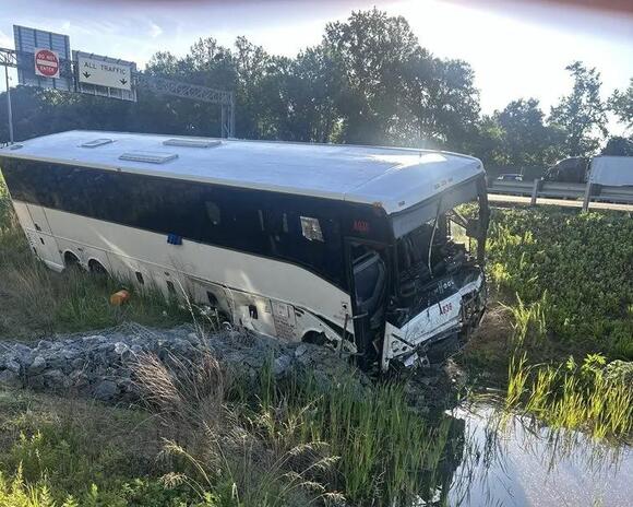 Bus driver in deadly Stafford crash taken into custody, charged with ...