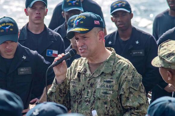 Retired Navy Admiral Robert Burke charged over alleged bribery scheme