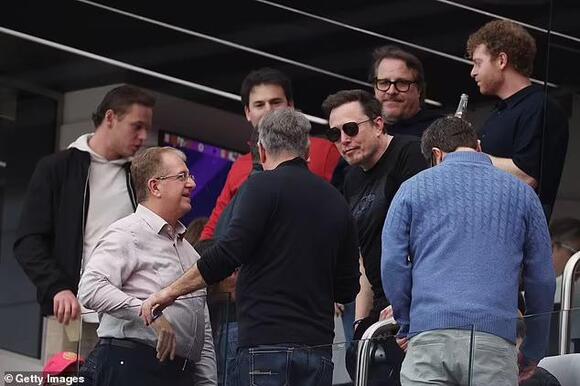 Elon Musk takes a front-row seat in a Super Bowl suite alongside his ...