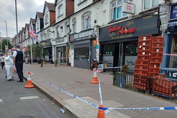 Boy, 15, and man arrested after fire attack on Indian restaurant in ...