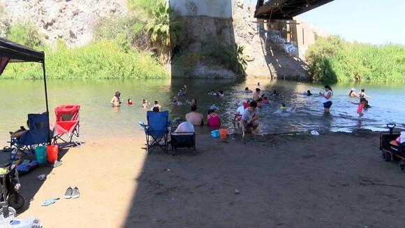 Locals celebrating Labor Day by the river