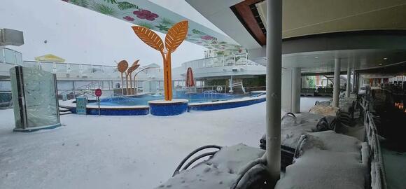 Photos show Royal Caribbean cruise ship blanketed by snow in major ...