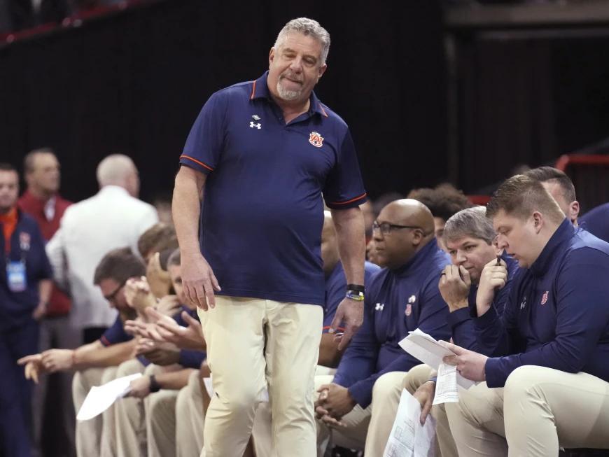 Auburn coach Bruce Peal questions officials over ejection of Chad Baker ...