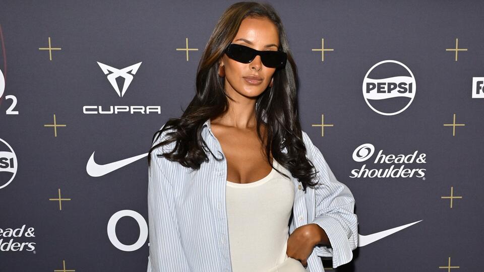 Maya Jama Poses in White Cutout Dress in Set Photos - NewsBreak