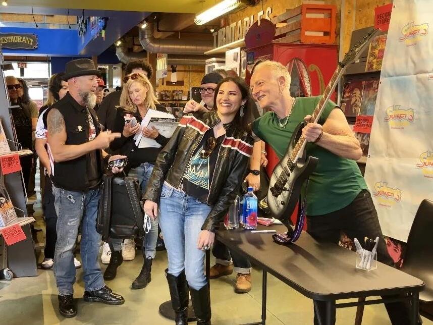 Def Leppard fans line up at Salzer’s Records to see guitarist Phil ...