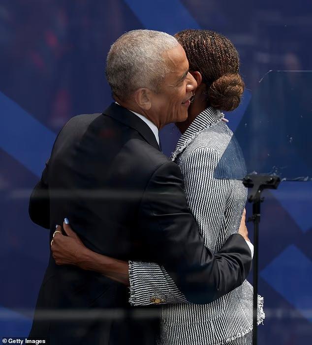 Michelle Obama dispels marriage rumors as she sings husband's praises ...