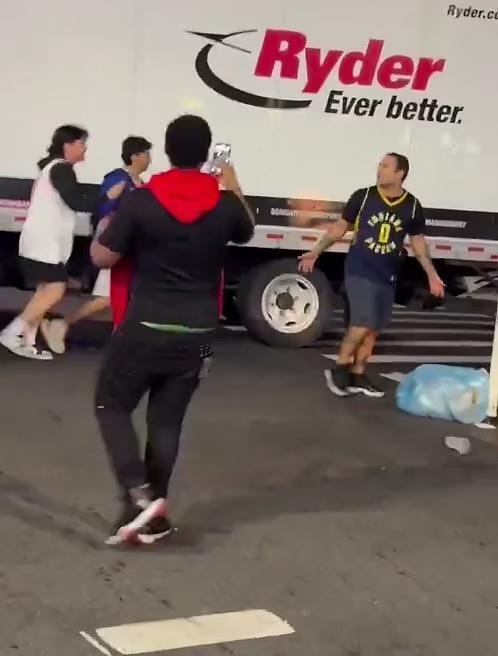 Ugly moment Knicks fans attack rival NBA supporter with trash bag and ...