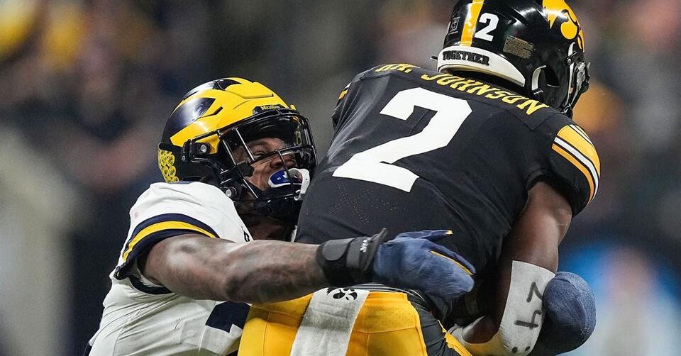 Michigan linebacker Junior Colson taken by Jim Harbaugh, Los Angeles ...