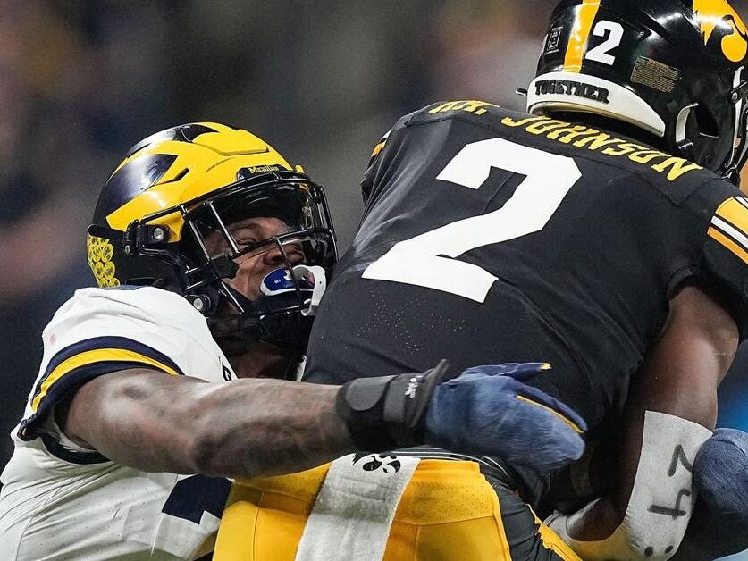 Michigan linebacker Junior Colson taken by Jim Harbaugh, Los Angeles ...