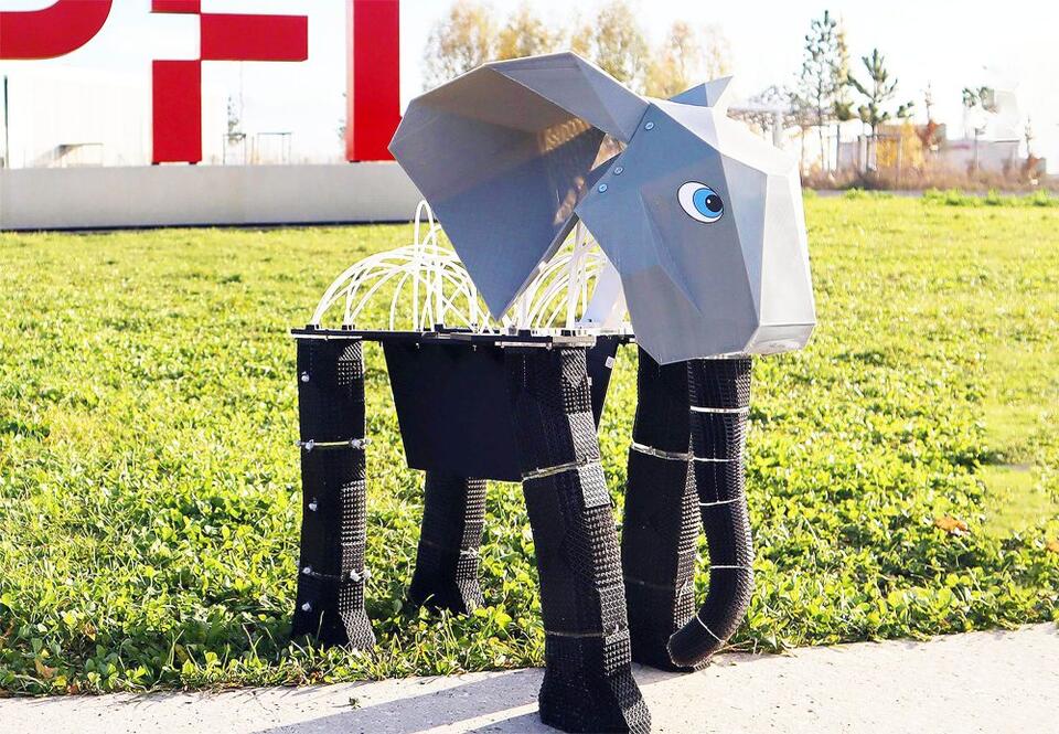 Elephant robot named ‘EleBot’ lifts weights and picks flowers with a ...