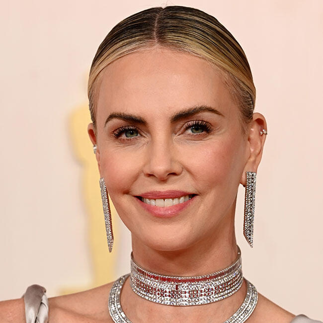 ‘Stunning’ Charlize Theron Turns Heads In A Halter Neck Top & Black ...