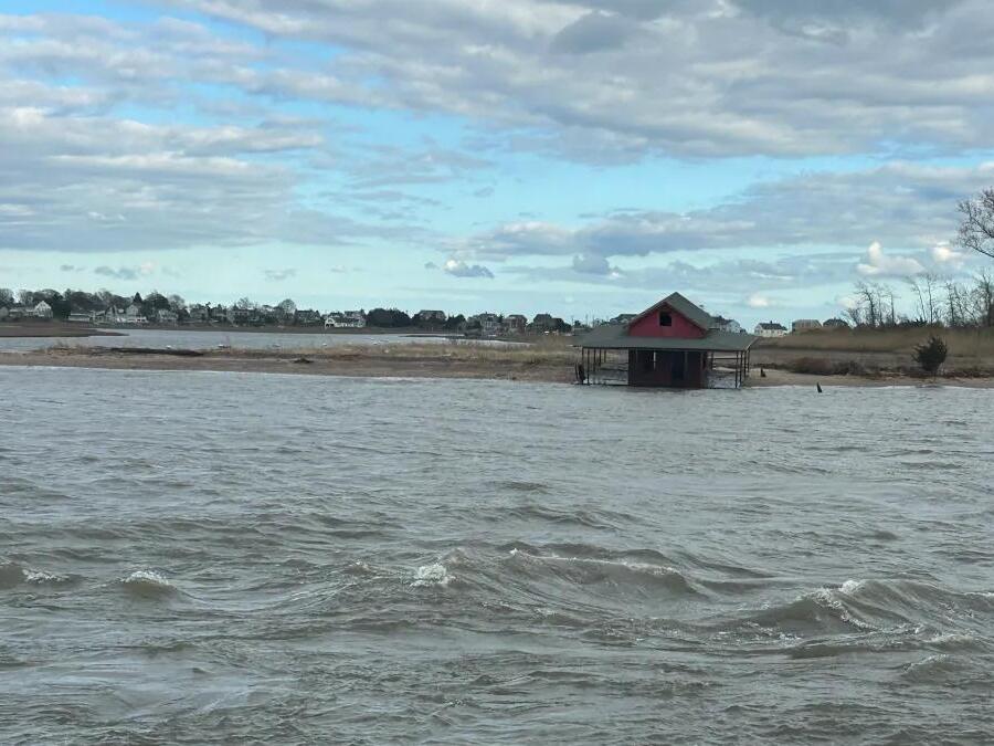 Guilford's Little Red Shack overcome by rain and tide
