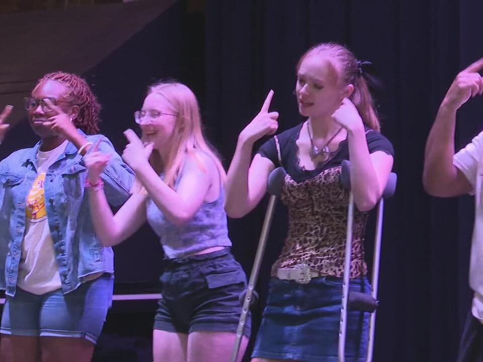 ASL program blossoms at Grimsley High School