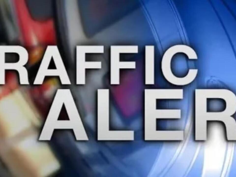 Road closed after crash involving downed utility lines Road closed after crash involving downed utility lines