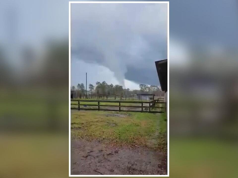 Watch: Videos, photos show possible tornado over Jacksonville during ...