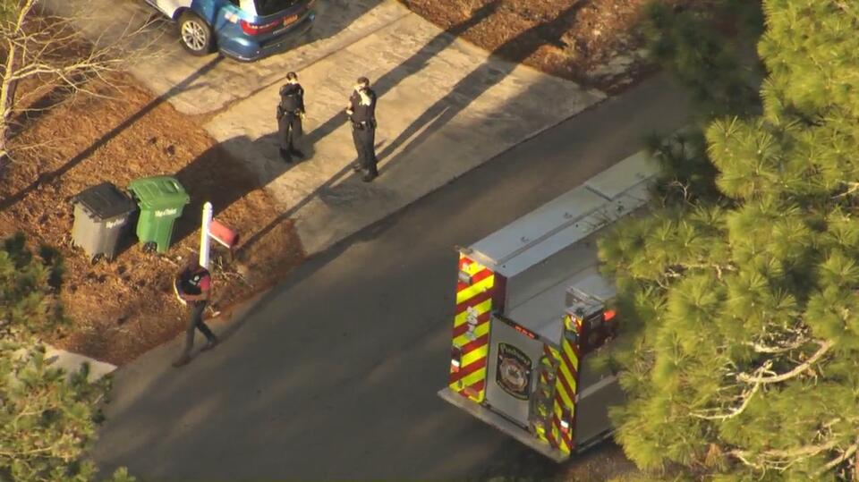 Police: Ax-wielding man charged at officers before being shot to death ...