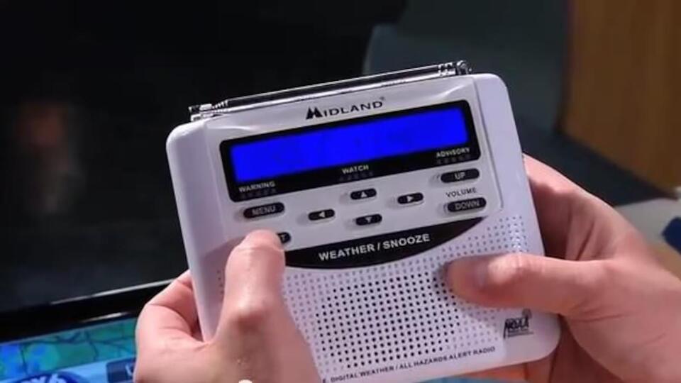 Jeremy Goodwin helps program weather radios around NE Kansas - NewsBreak