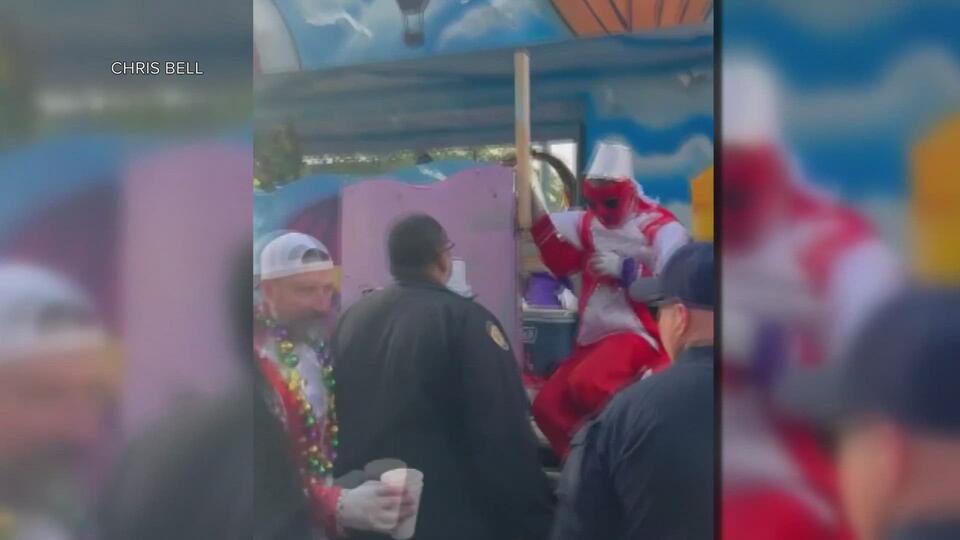 Krewe of Thoth riders threw beads at paradegoers with anti‑ICE Signs ...