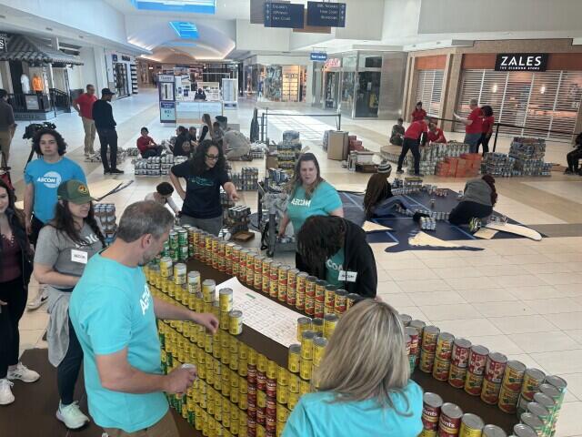 Can-struction community service competition collects food for the ...