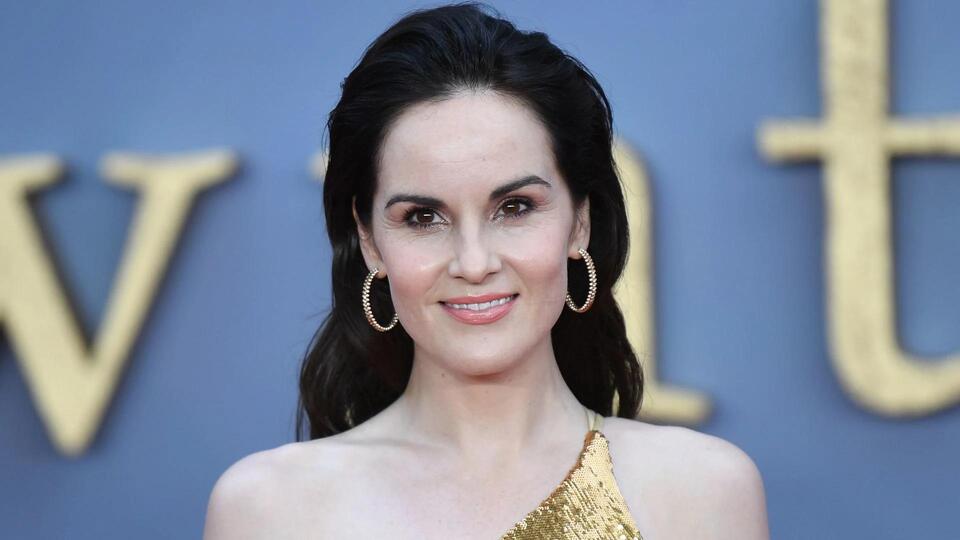 Downton Abbey star Michelle Dockery debuts baby bump alongside husband Jasper Waller-Bridge ...