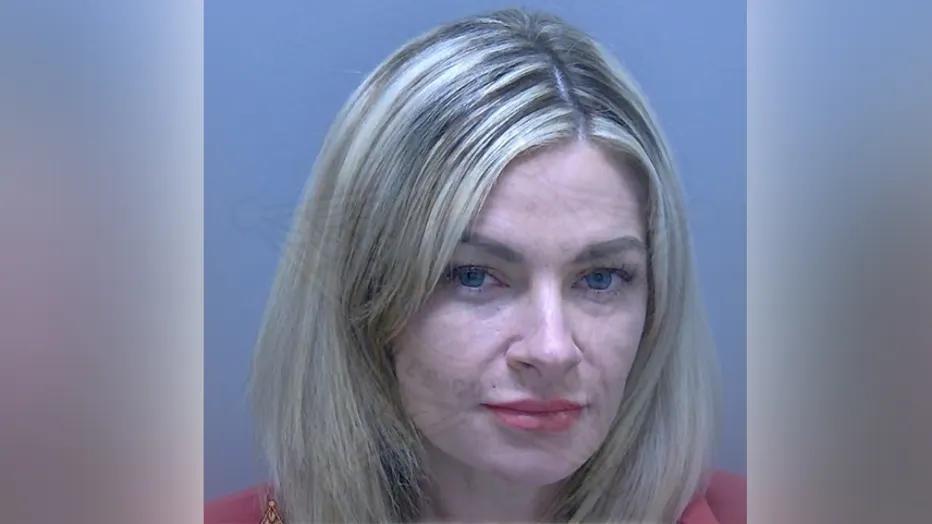 Florida woman who denied throwing brick through ex's window caught on ...