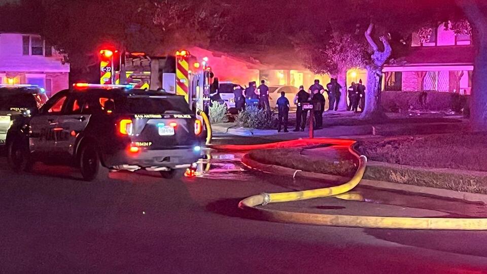 Barricaded individual found dead after fire breaks out throughout home ...