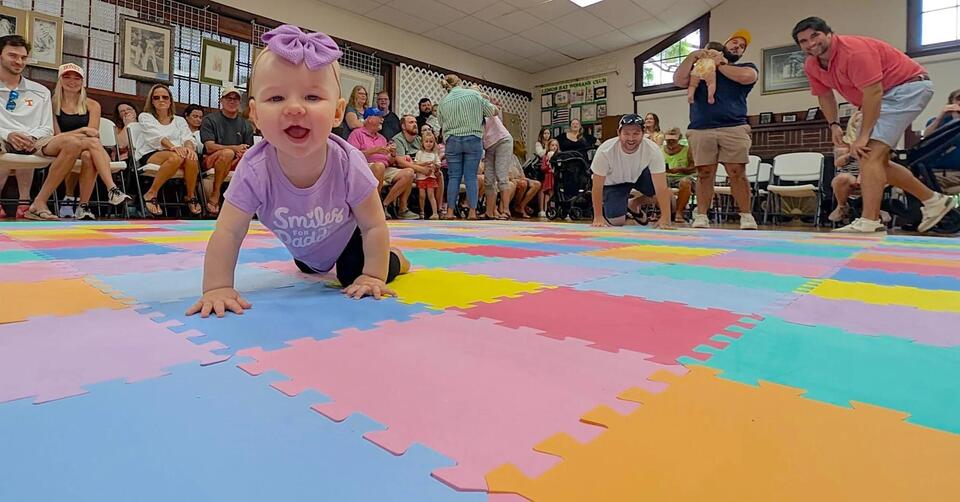 Crawling to victory: Girls win the 2025 Diaper Derby race - NewsBreak