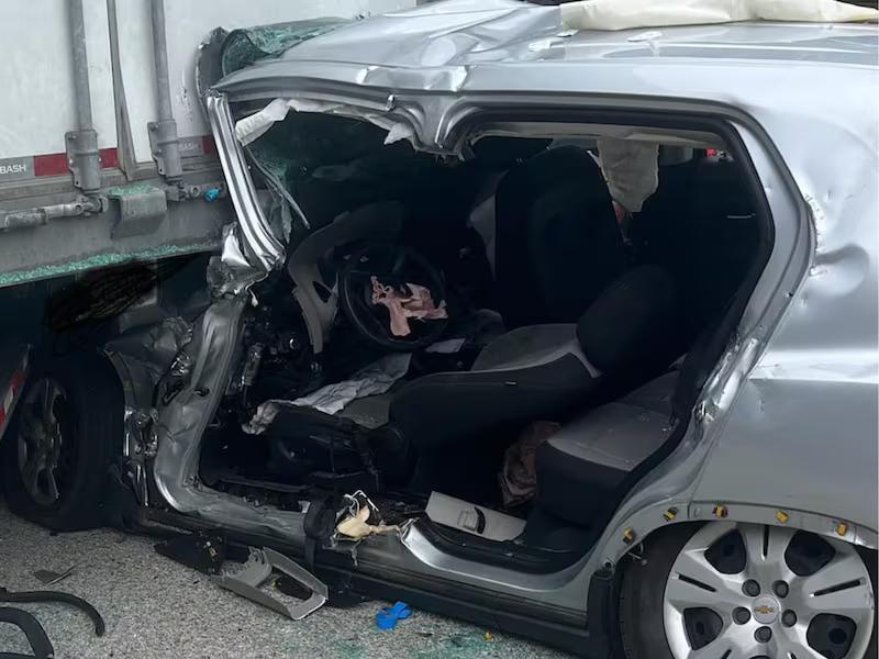 1 injured in Hampton after car rear-ends semi-truck