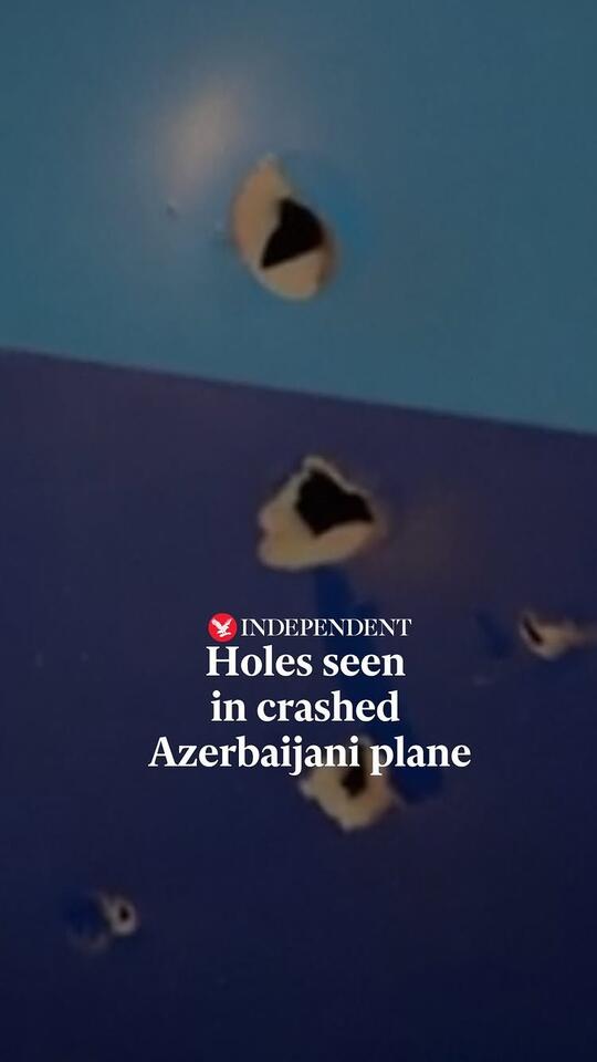 Footage from the wreckage of Azerbaijan Airlines flight JS-8243 shows the plane’s tail peppered ...