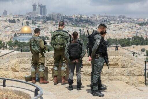 Israeli soldiers gather on the Mount of Olives, overlooking Jerusalem's ...