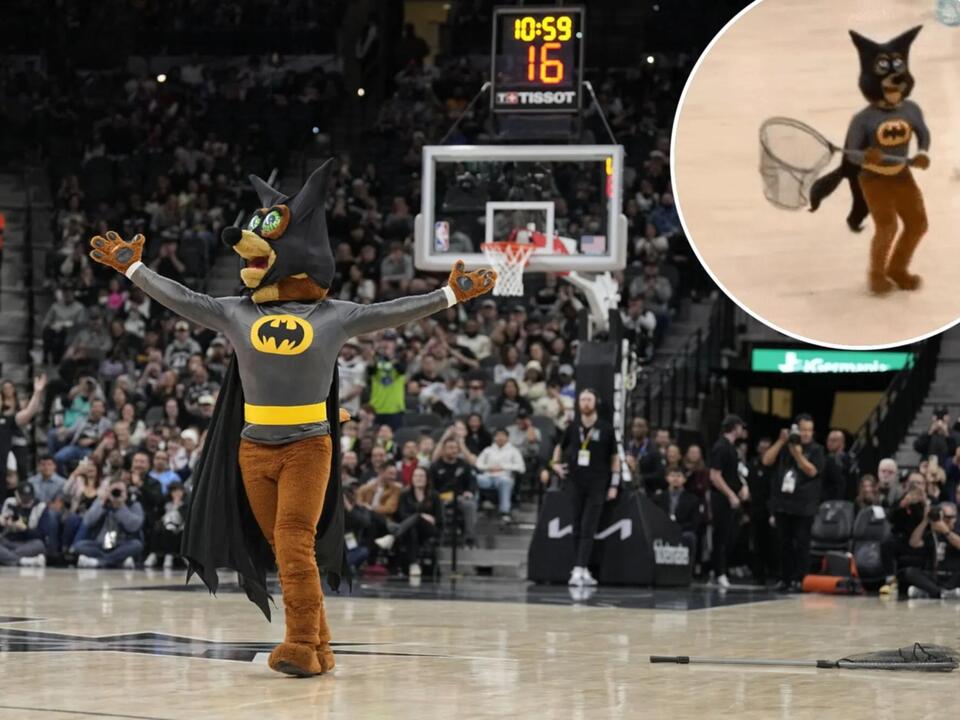 Spurs mascot in Batman costume catches real bat on court in bizarre scene