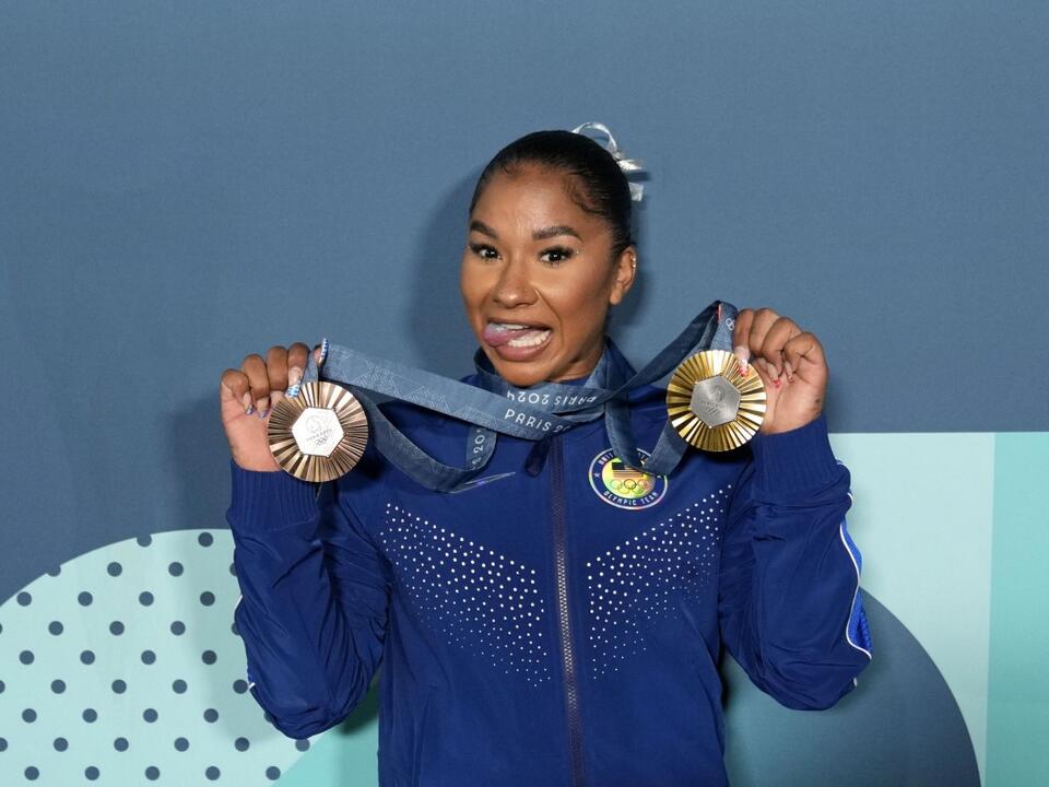 Jordan Chiles Wows Fans with Viral Poolside Swimsuit Photos