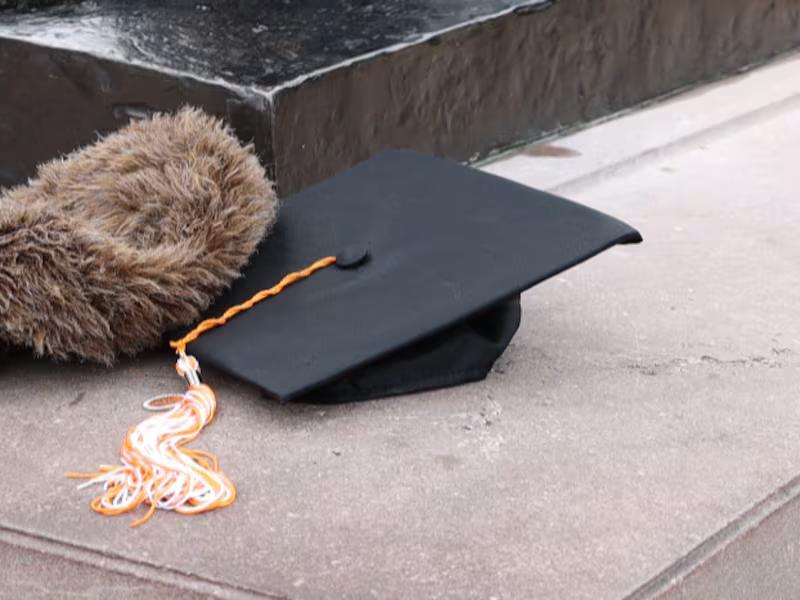 UT student trades his Davy Crockett hat for a graduation cap