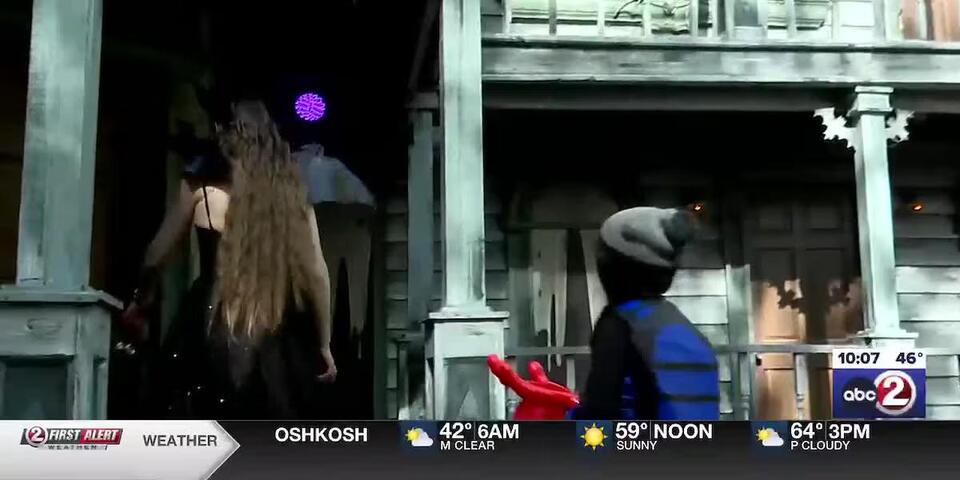 Families take in pre-Halloween scares at trick-or-treating event at ...