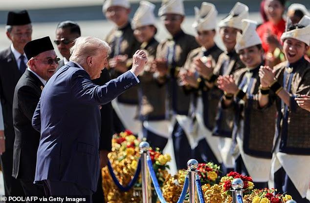 Trump performs iconic fist-pump dance with Malaysian artists as he ...