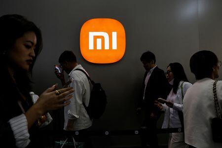 Xiaomi raises EV sales target, plans new overseas stores as Q4 revenue ...