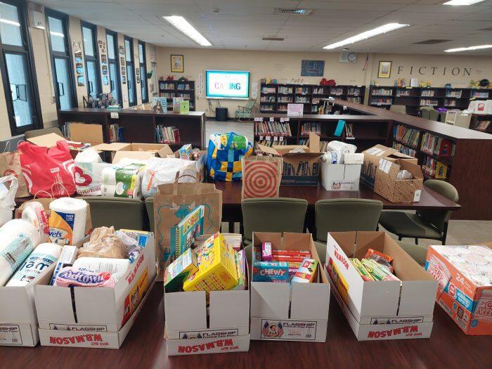 Fifth graders from New Lane Elementary School collect donations for a ...