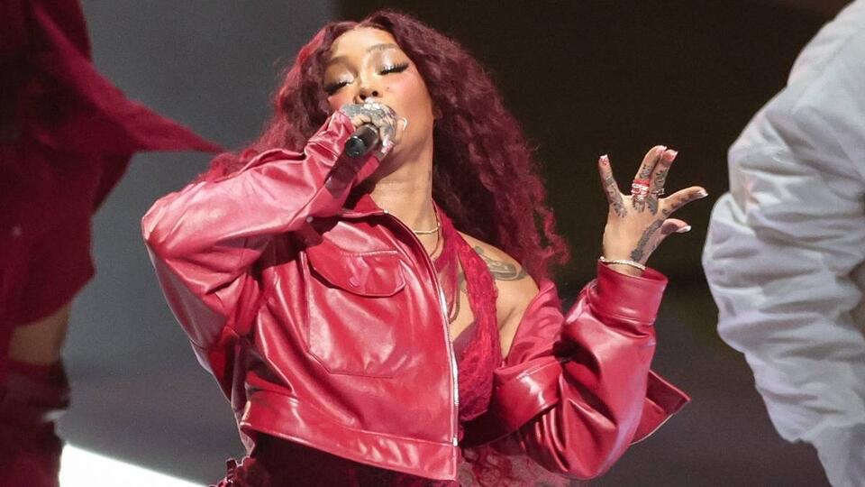 SZA’s Channels Valentine’s Vibes in Red Shorts Look Post Grammys ...